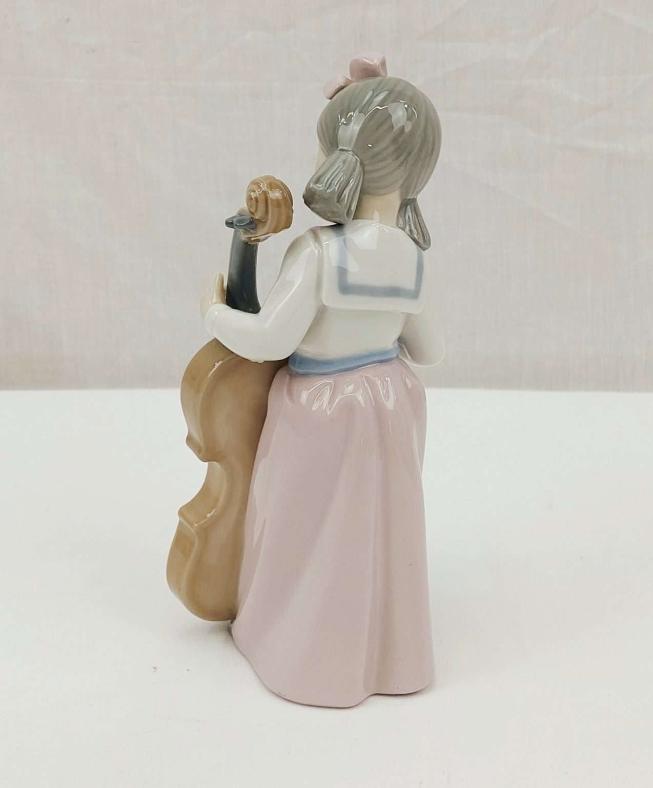 Lladro Nao Girl With Cello Ceramic Figurine - Sally Antiques