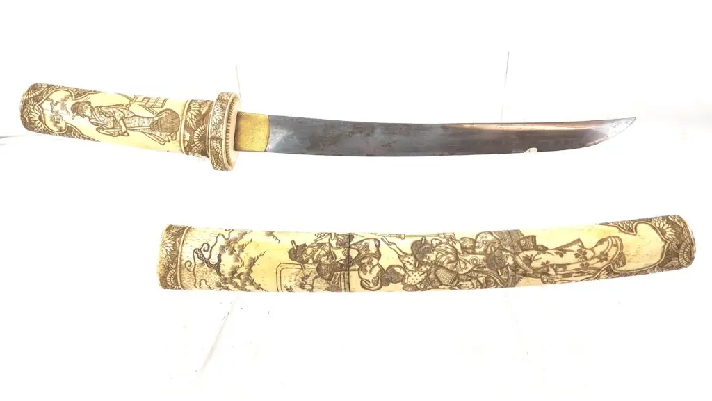 Japanese, Meiji period (1868-1912), Large Carved Tanto Dagger with 11 ...